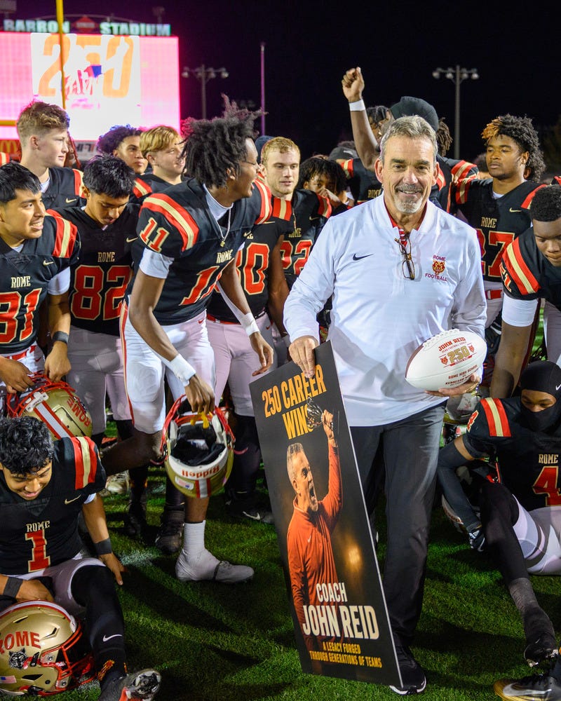 Updated: John Reid retiring as Rome High head football coach.