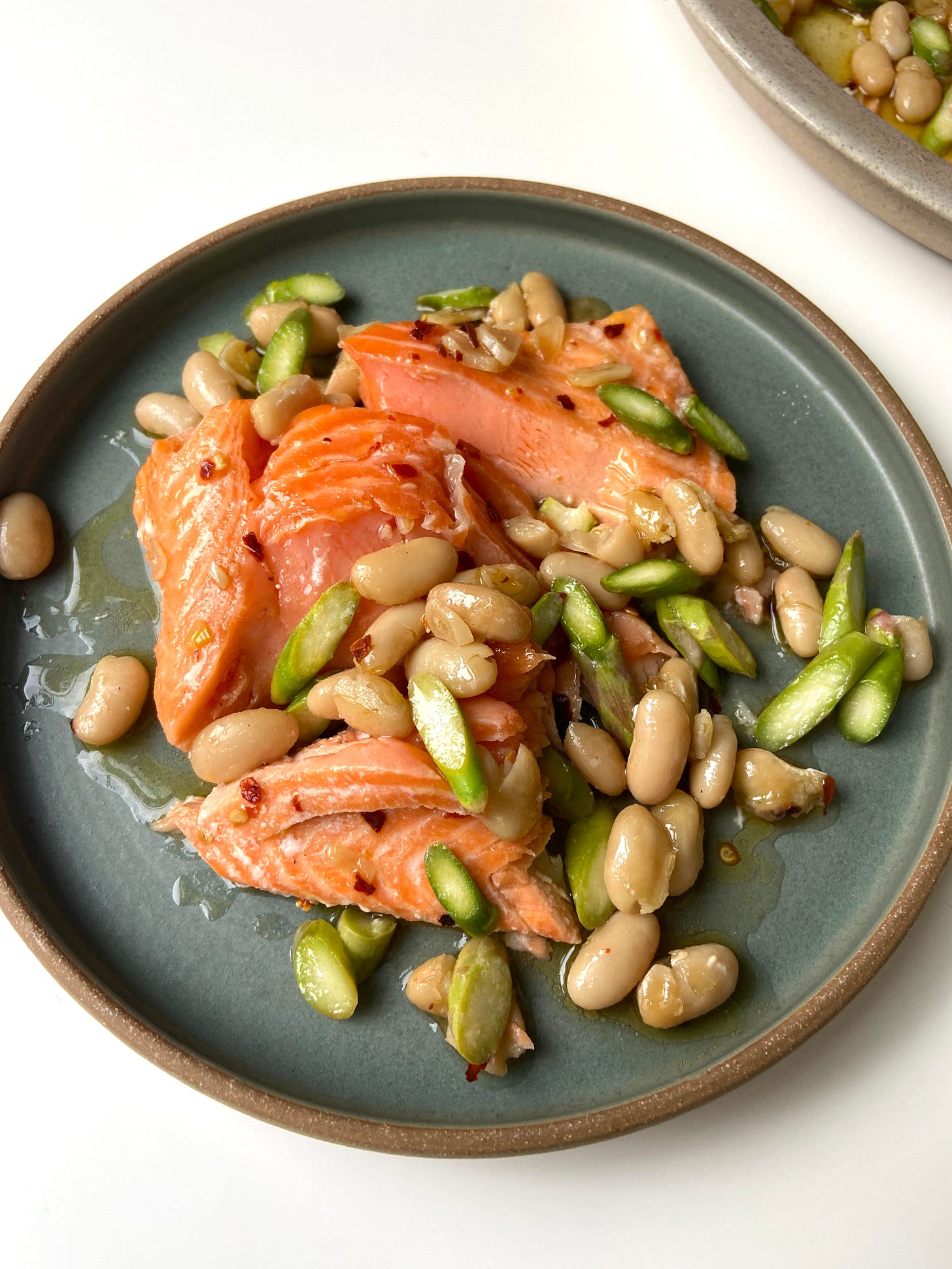 Skillet lemony fish with asparagus and white beans