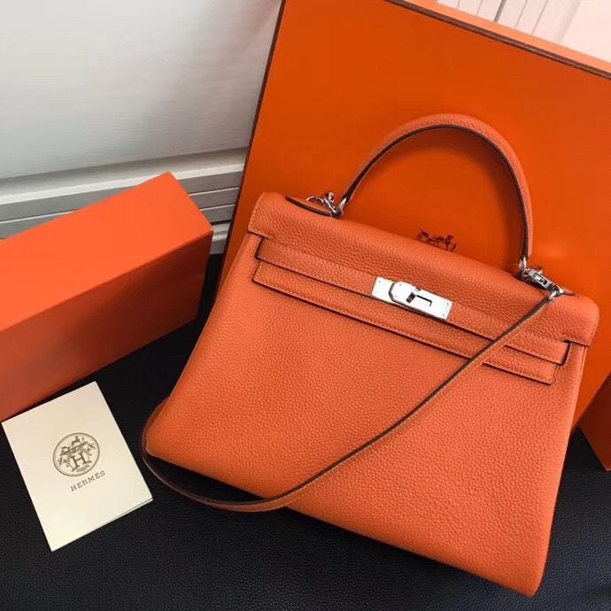 why does hermes use orange