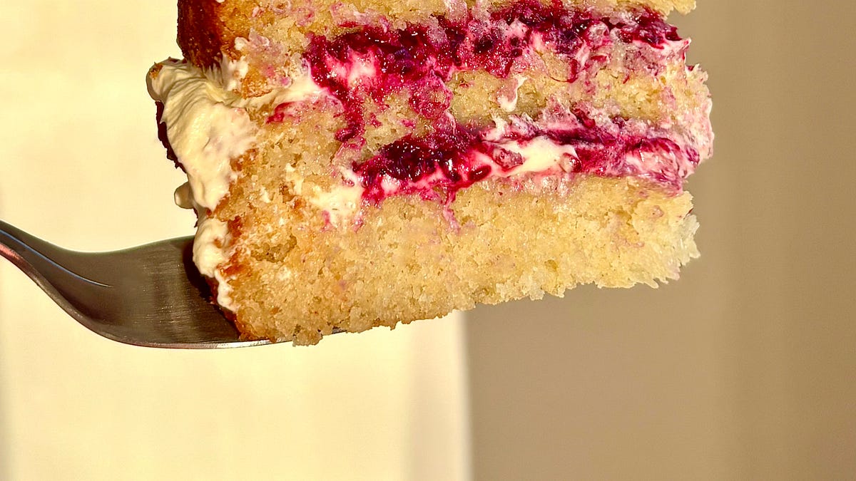 Coconut Sponge, Coconut Cream, Raspberry, Rose and Blackberry Filling.