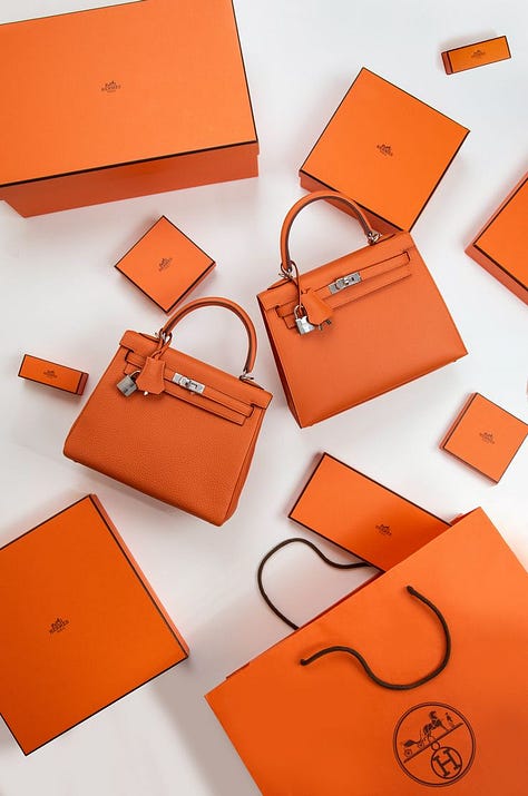 why does hermes use orange