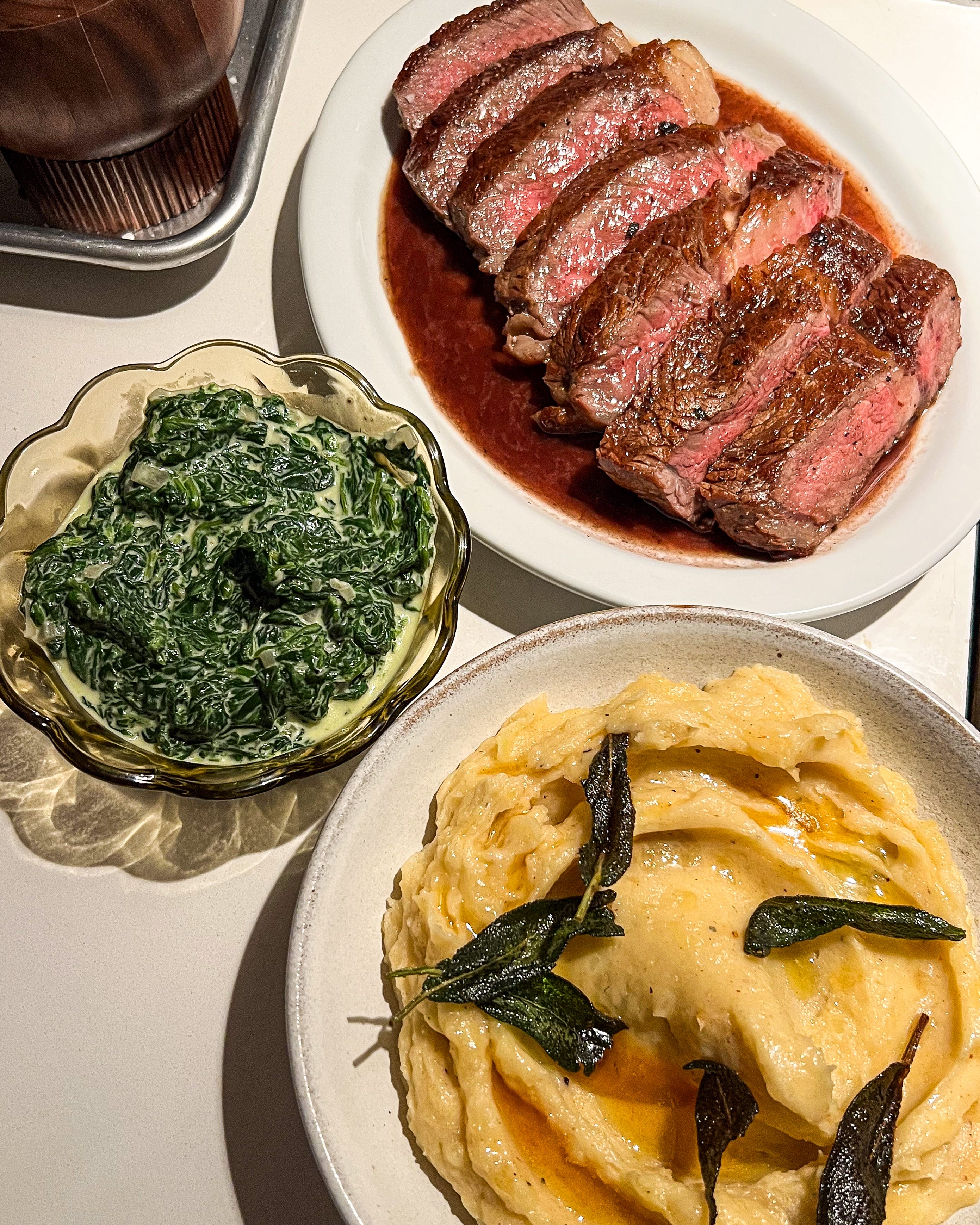 Sage and Garlic Ribeye Steak with Red Wine Pan Sauce