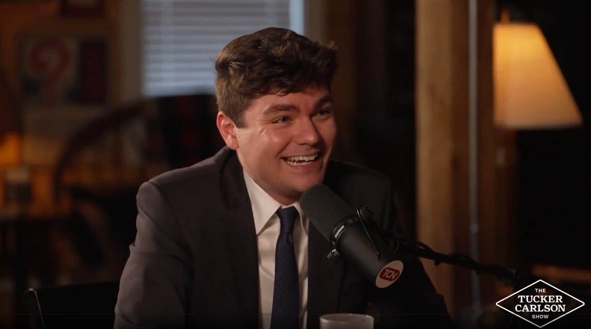 Nick Fuentes enters the Republican mainstream in softball Tucker ...