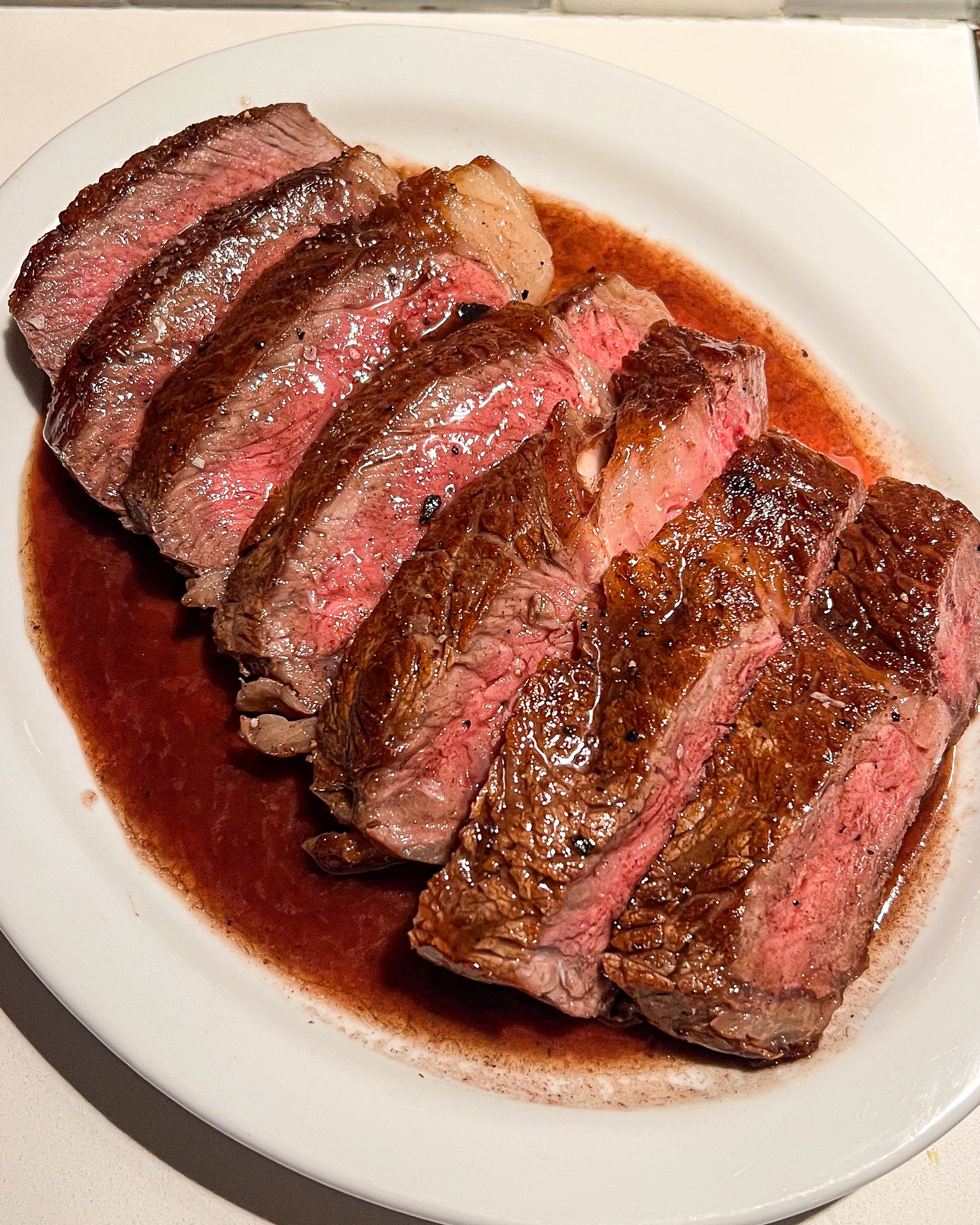 Sage and Garlic Ribeye Steak with Red Wine Pan Sauce