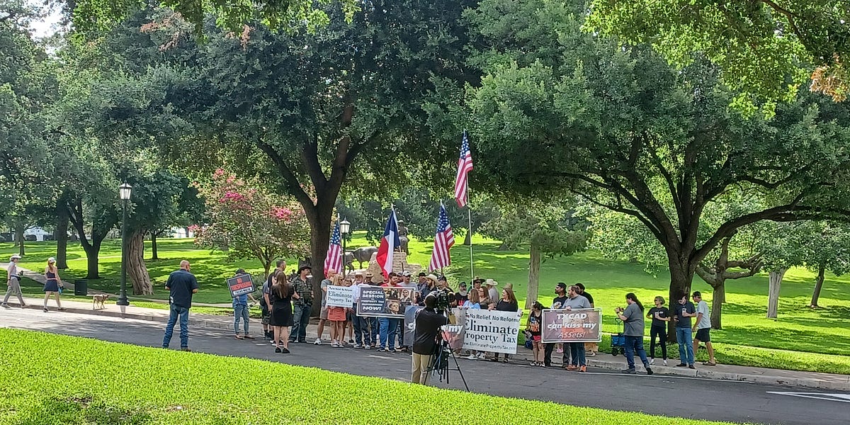 Rally to Abolish Property Taxes Attracts Strong Opinions, Few People
