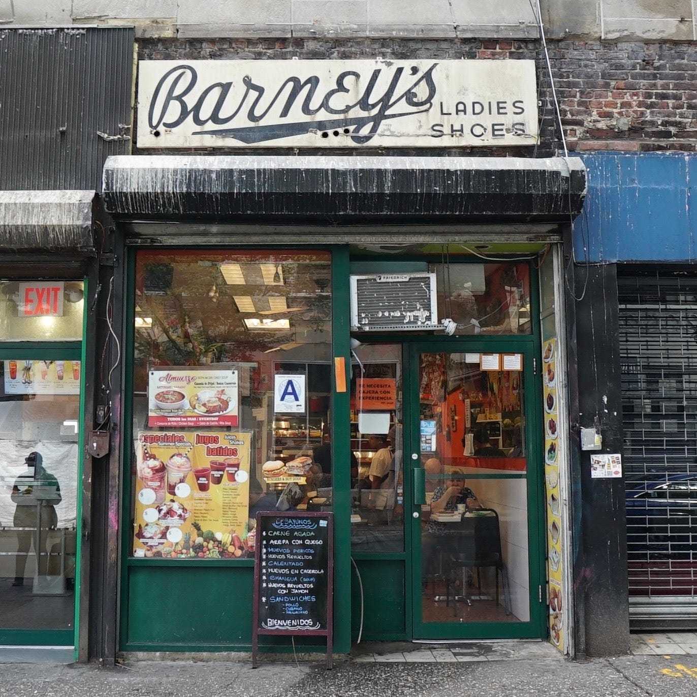 Hidden no longer: Historic neon shoe-store sign emerges from decades ...