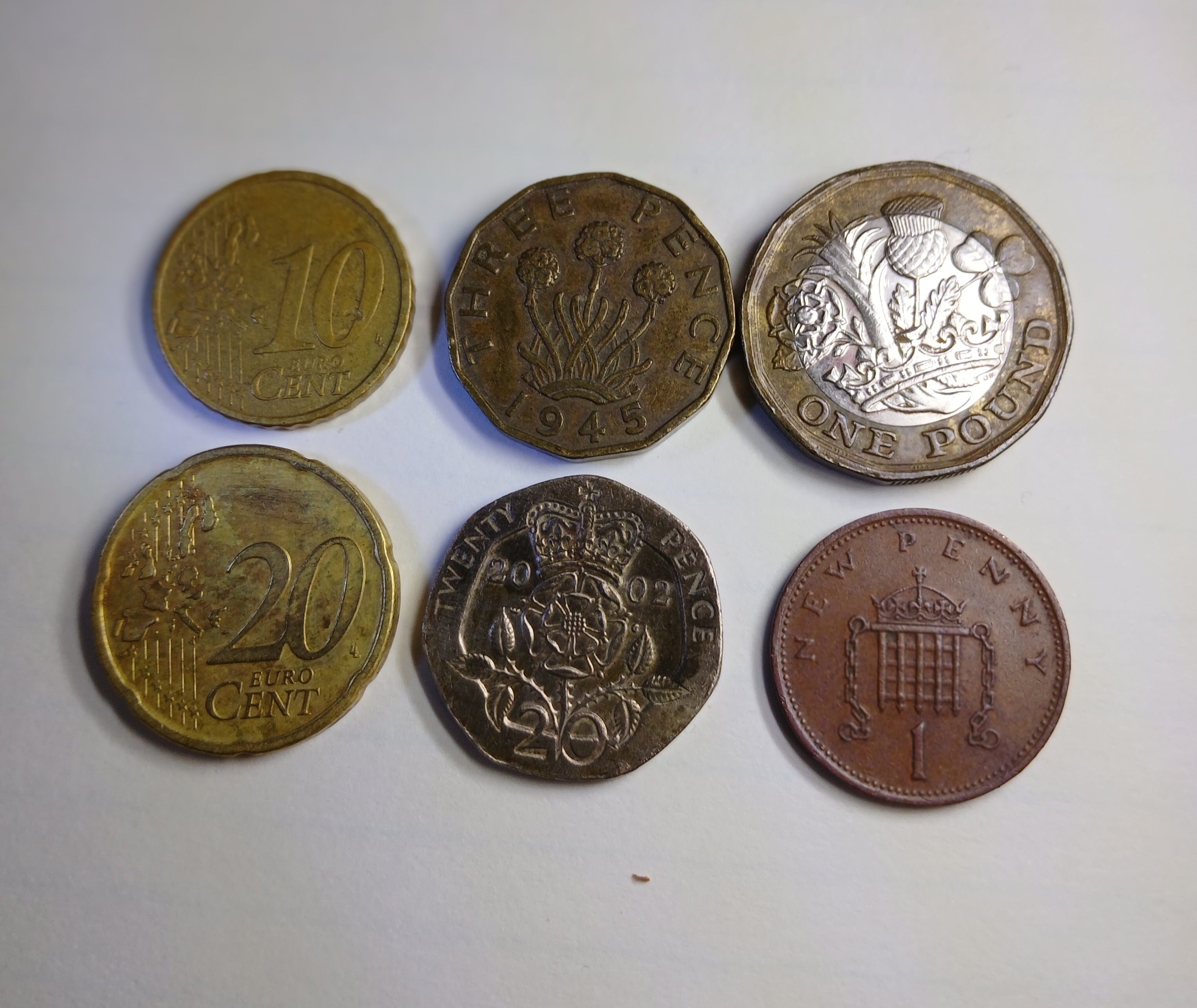 Foreign Coins - by Brent Cosey - Detector's Digest