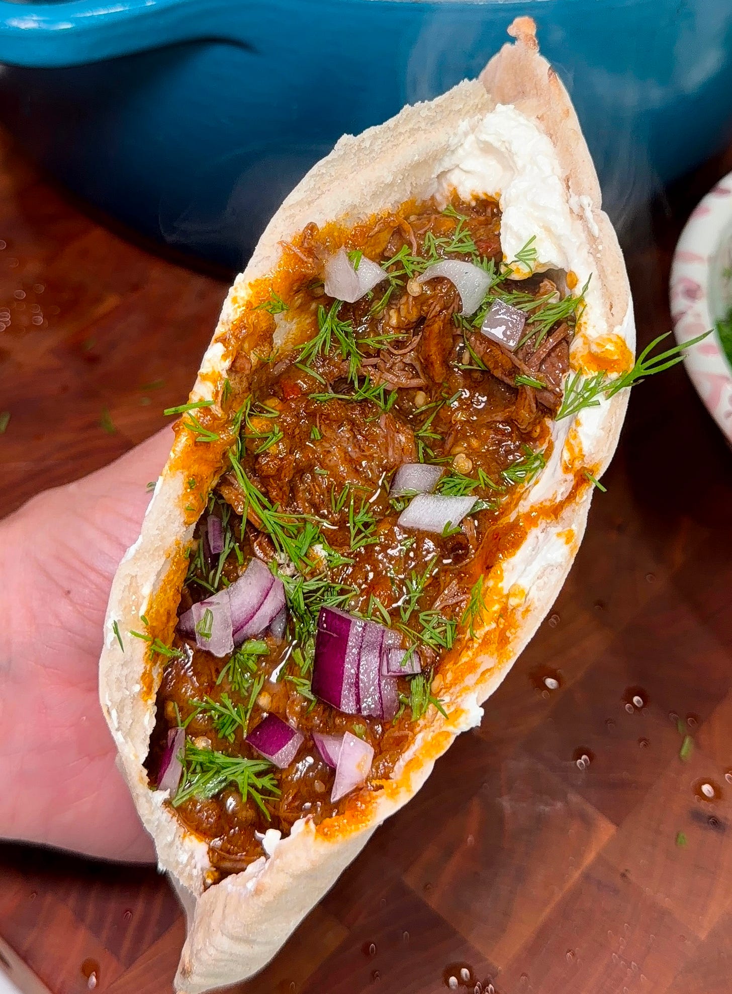 Braised Beef and Eggplant Stuffed Pitas - by Violet Witchel