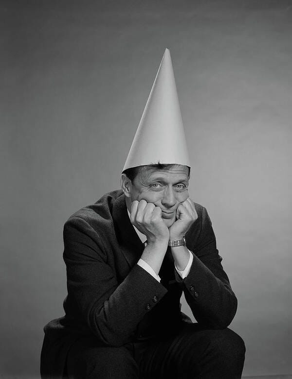Dunce Caps: For Dummies, Wizards, or Both?