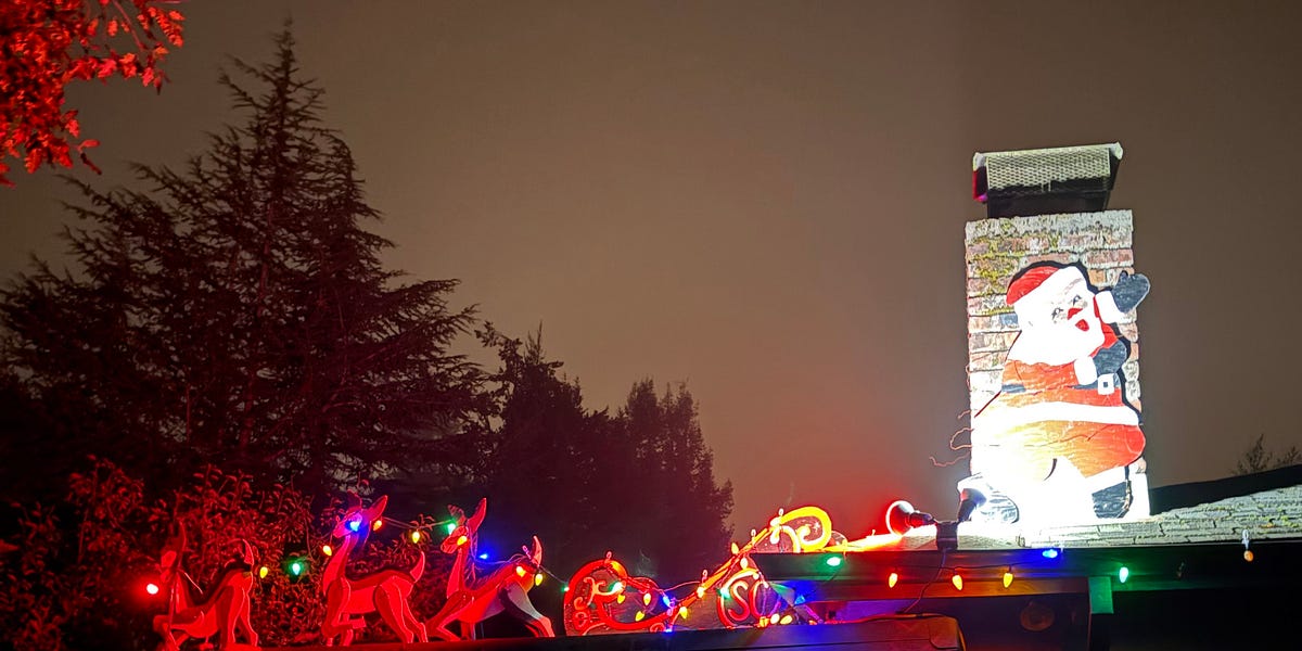 Up on the rooftop, reindeers pause, out jumps good ol' Santa Claus