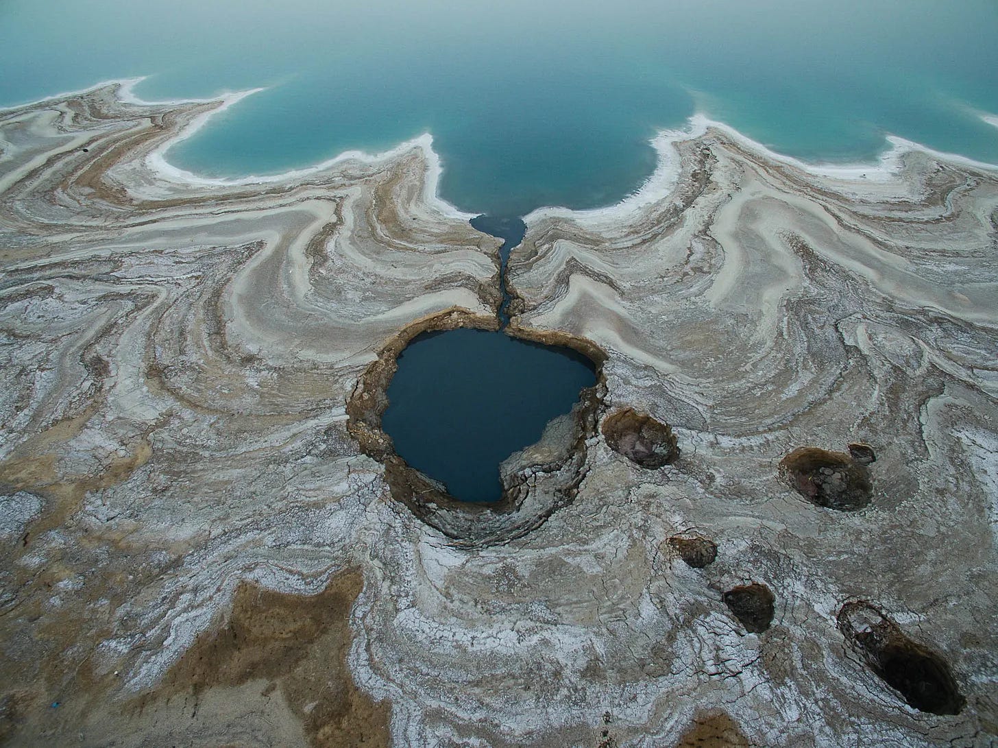 Striking in its beauty, the Dead Sea is actually drying up and disappearing