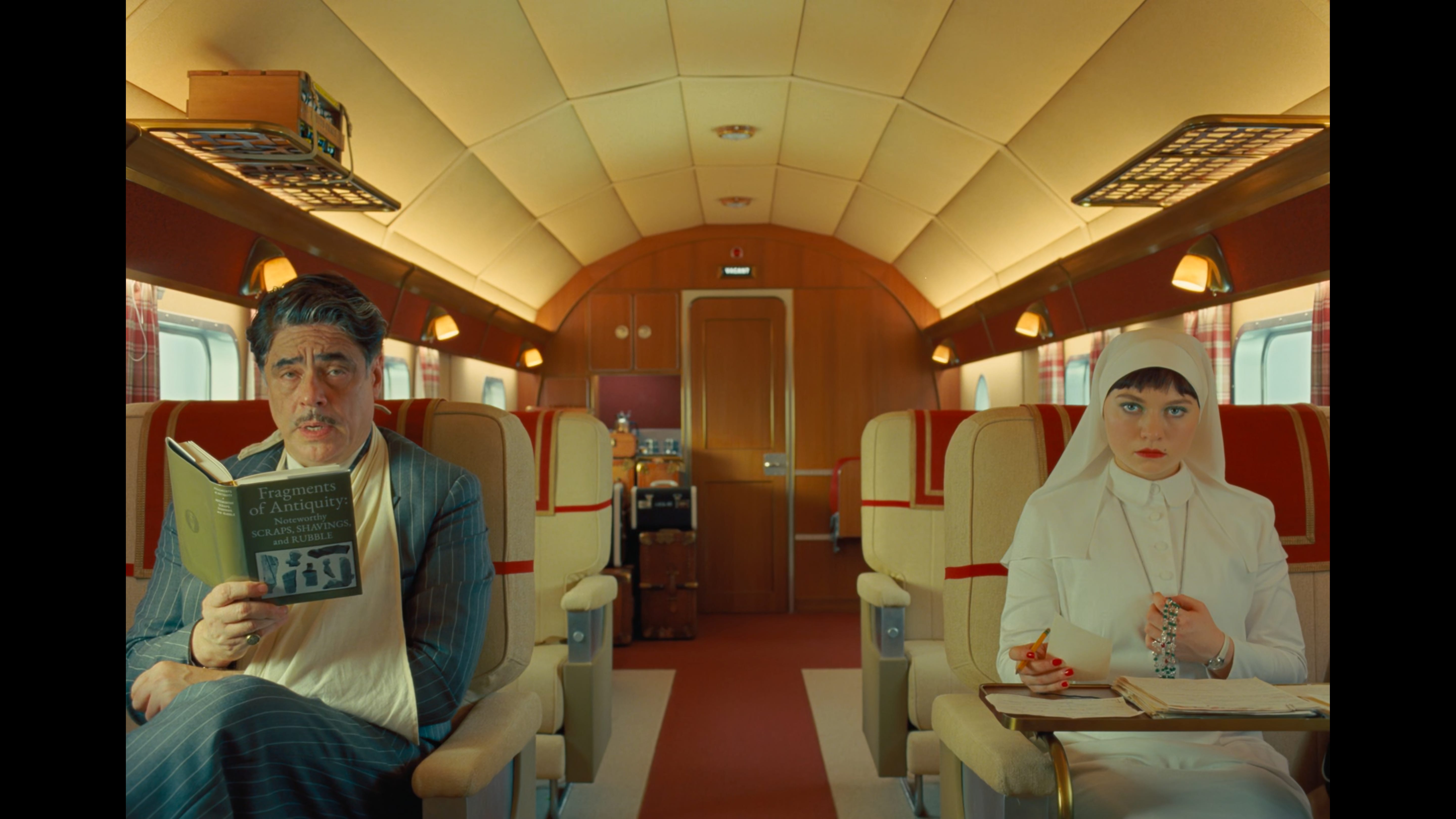 What books were Benicio del Toro reading in The Phoenician Scheme?