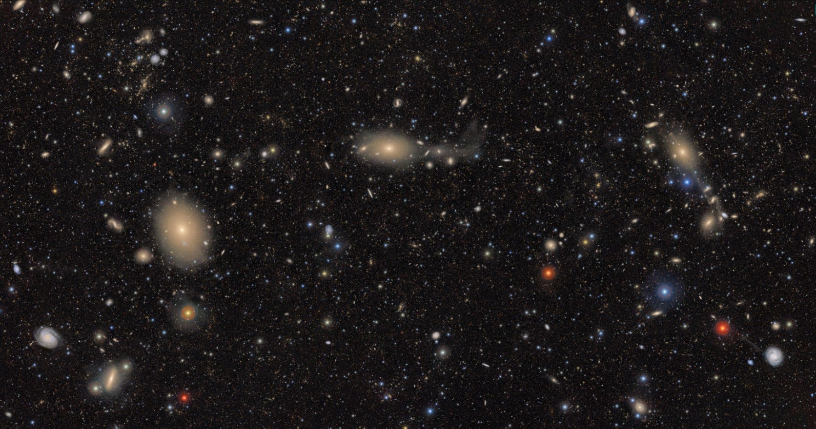 Stream of stars caught escaping from nearby galaxy