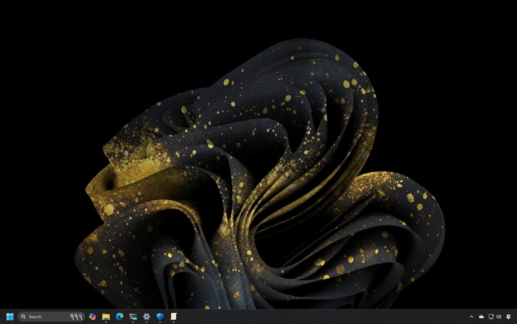 Windows 11 Dark and Gold Bloom Wallpaper and Tips