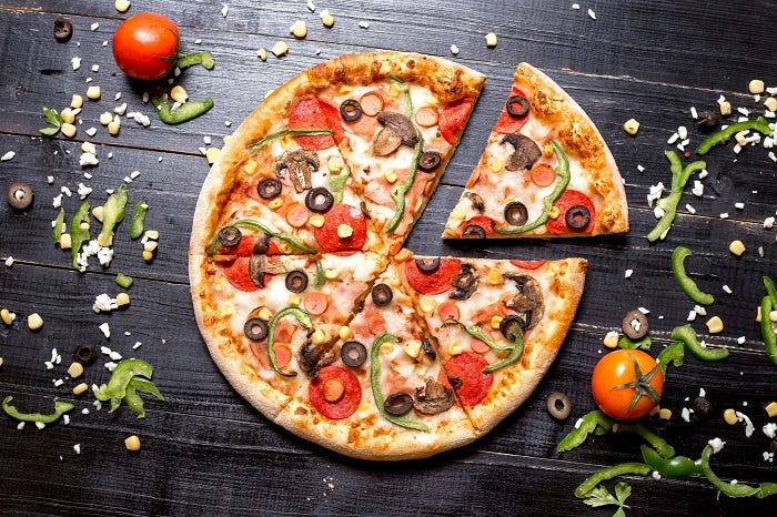 88 Pizza Jokes That Will Add Laughter and Extra Flavor to Your Day