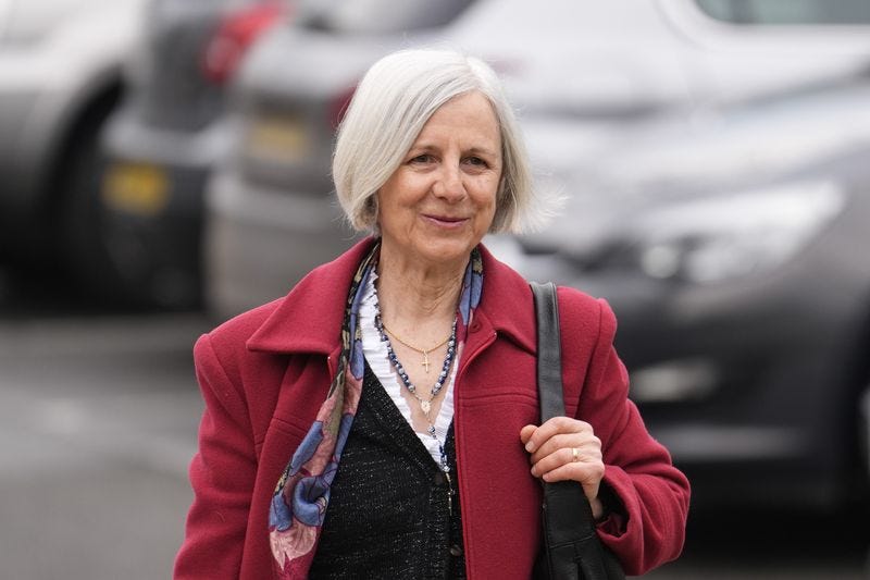 Woman Found Guilty of Holding Up Sign Saying ‘Here to talk, if you want ...