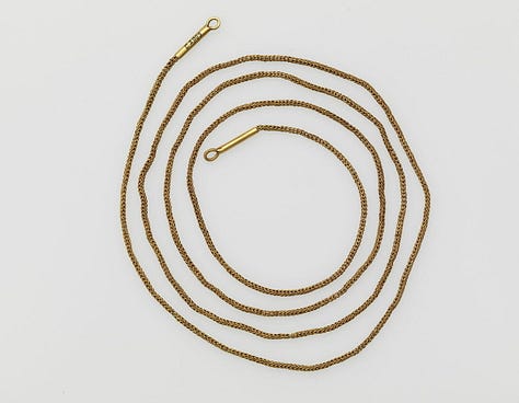 The Origin & History of Chain Necklaces - by Ashley Volbeda