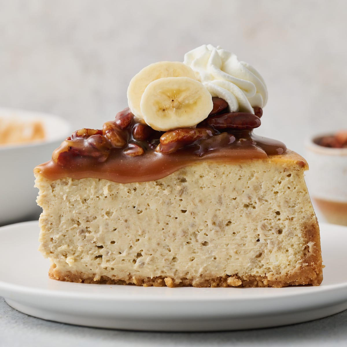 Banana Cheesecake with Gooey Pecan Sauce - Ashley Manila