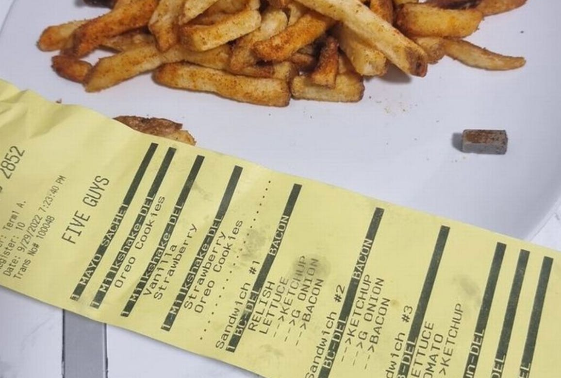 Woman finds huge chunk of metal in Five Guys' chips