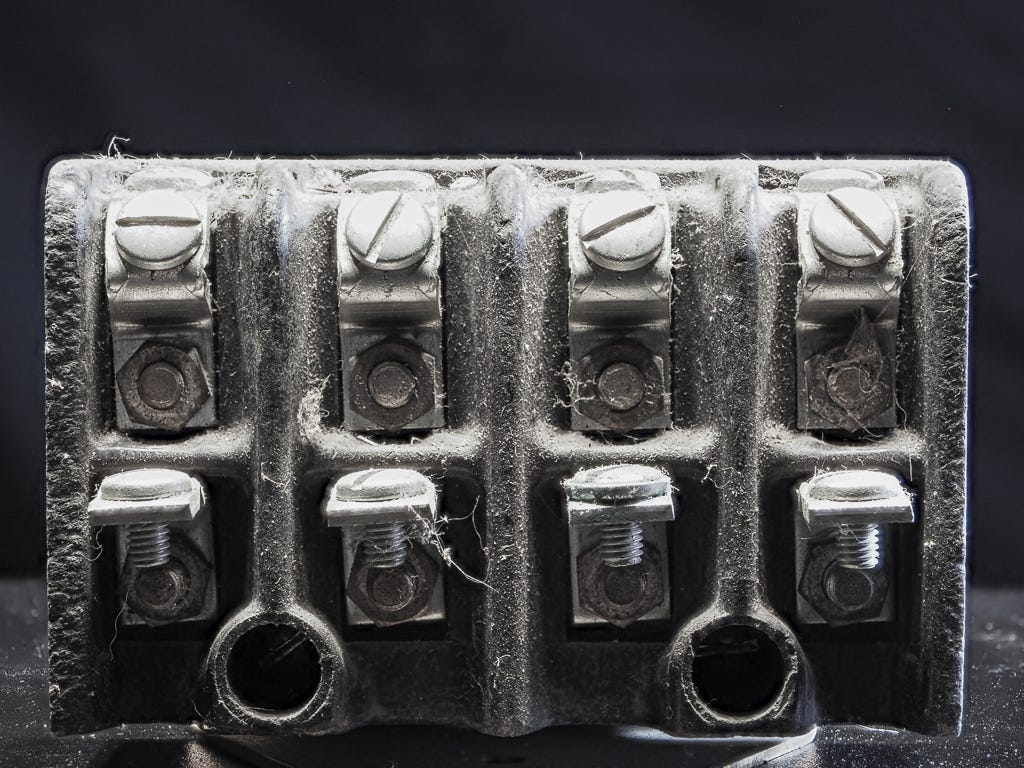 Macro Photography - Dusty Relays - by John M Poltrack