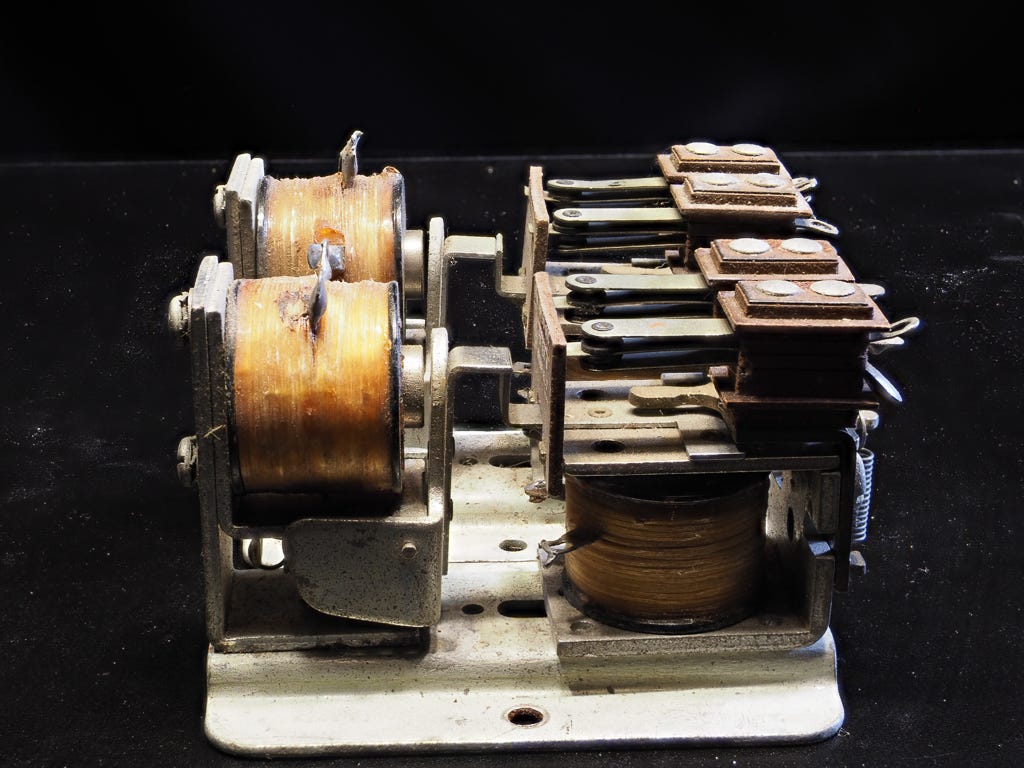 Macro Photography - Dusty Relays - by John M Poltrack