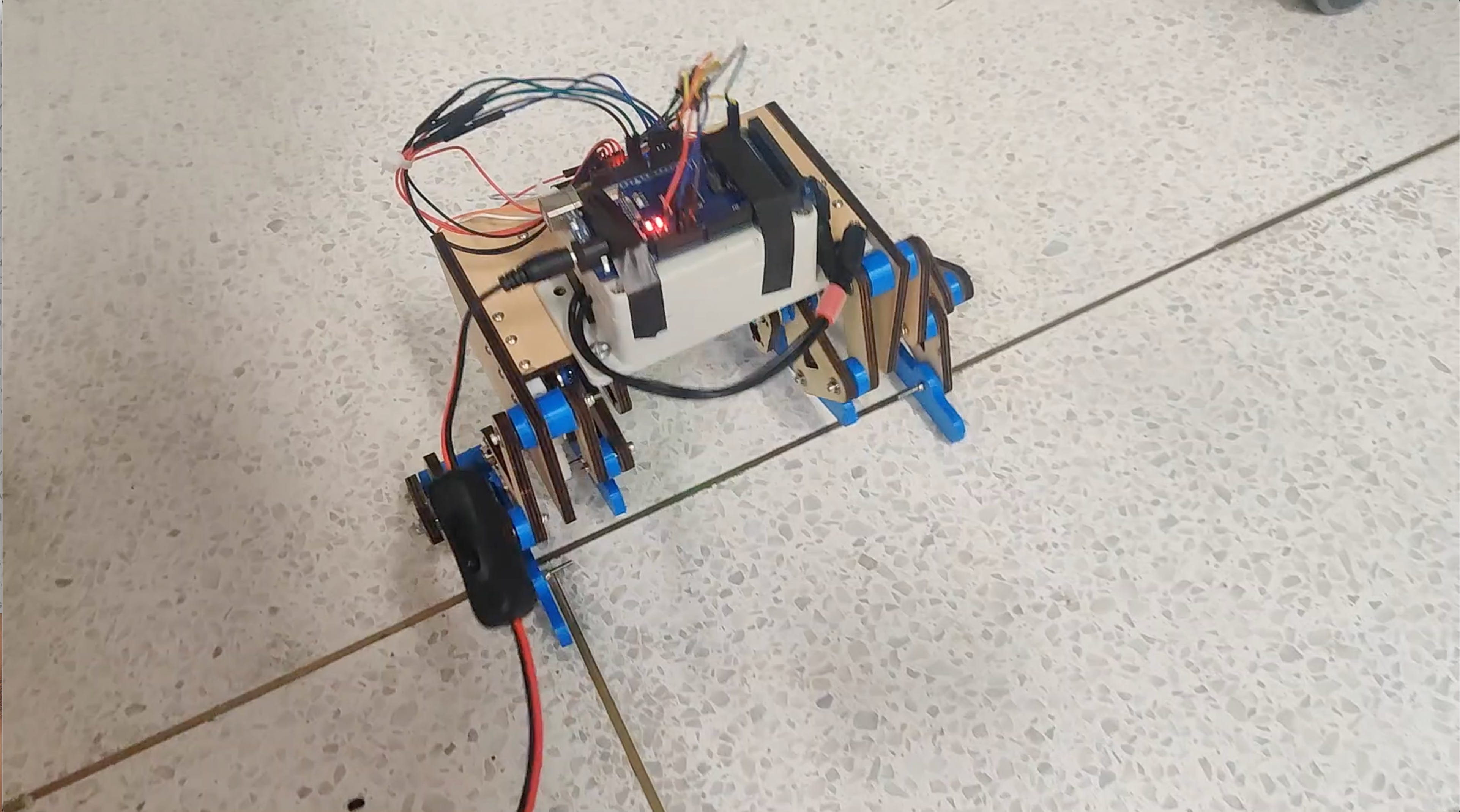 Robot Walker with Four Legs and Two Actuators