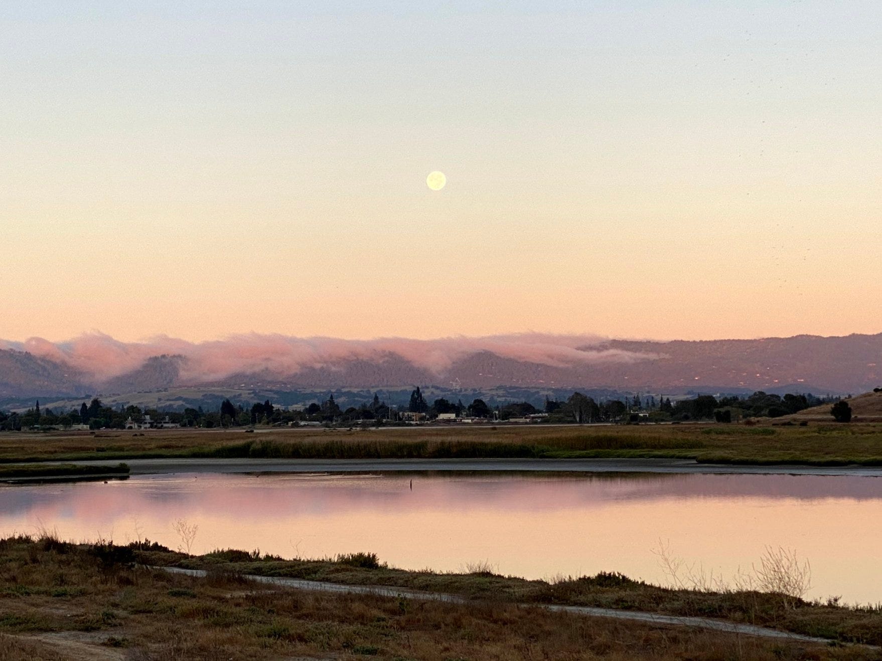Watching a full moon rising and setting