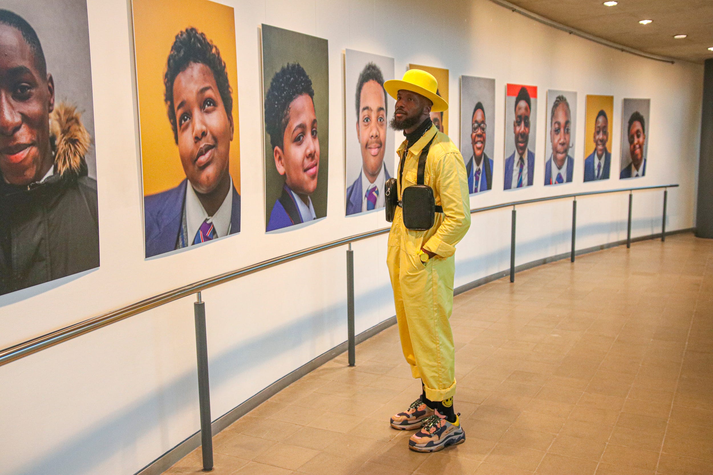 Kay Rufai takes photos of smiling teenagers.