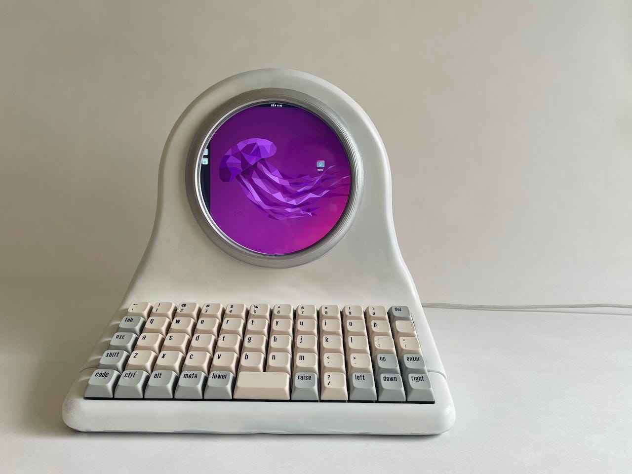 A Retro-Modern Linux Terminal with a Round Screen