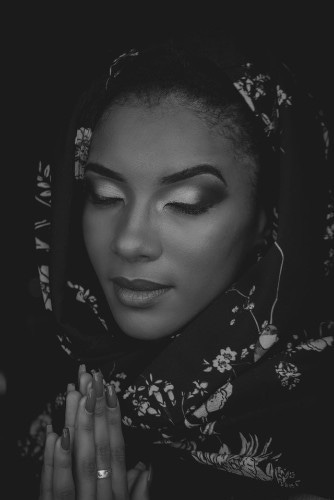 Why do black women wear bonnets and scarves?