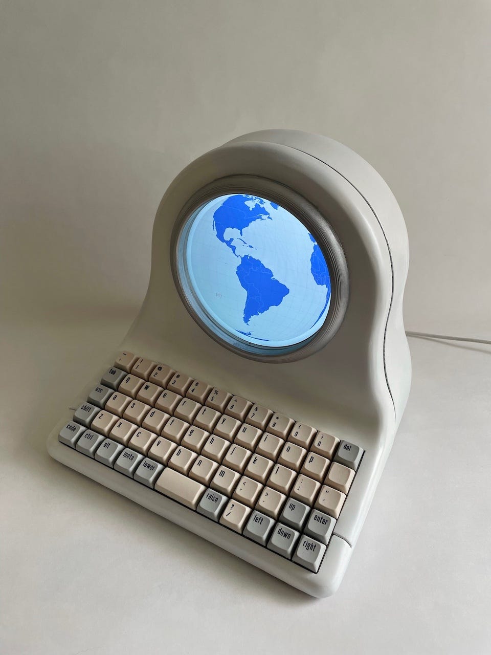 A Retro-Modern Linux Terminal with a Round Screen