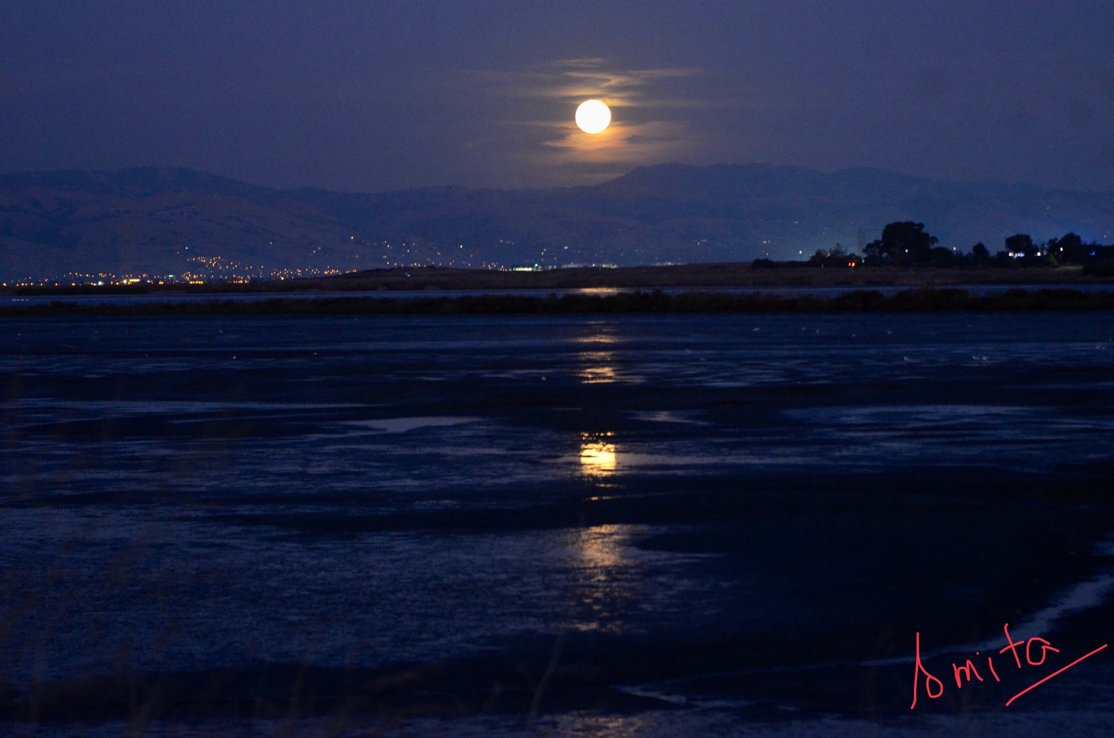 Watching a full moon rising and setting
