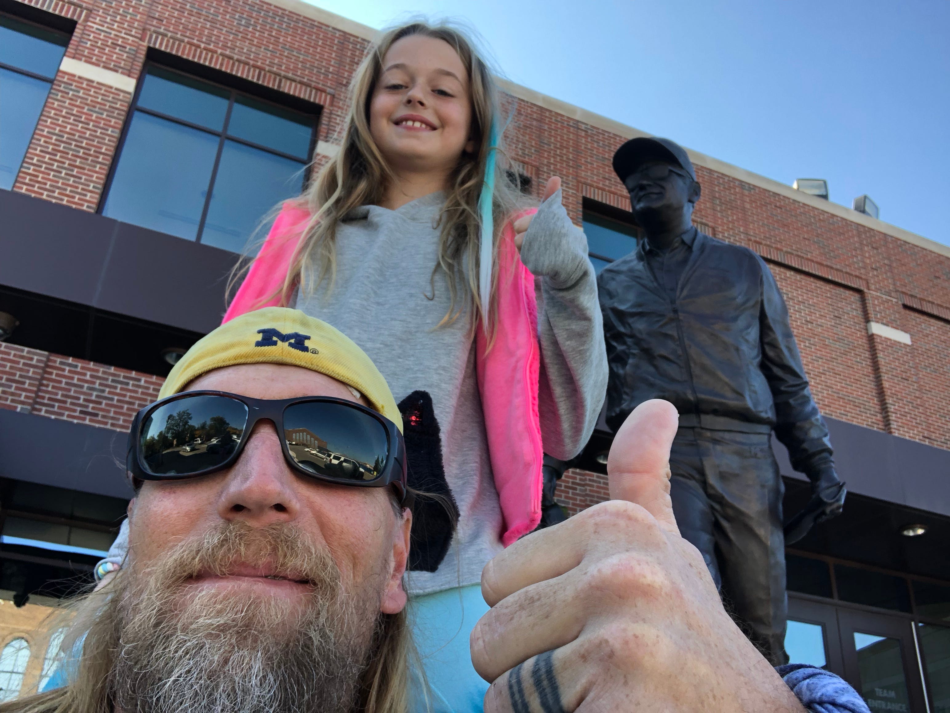 Viewing the Bo Schembechler Statue - by Steve Kornacki