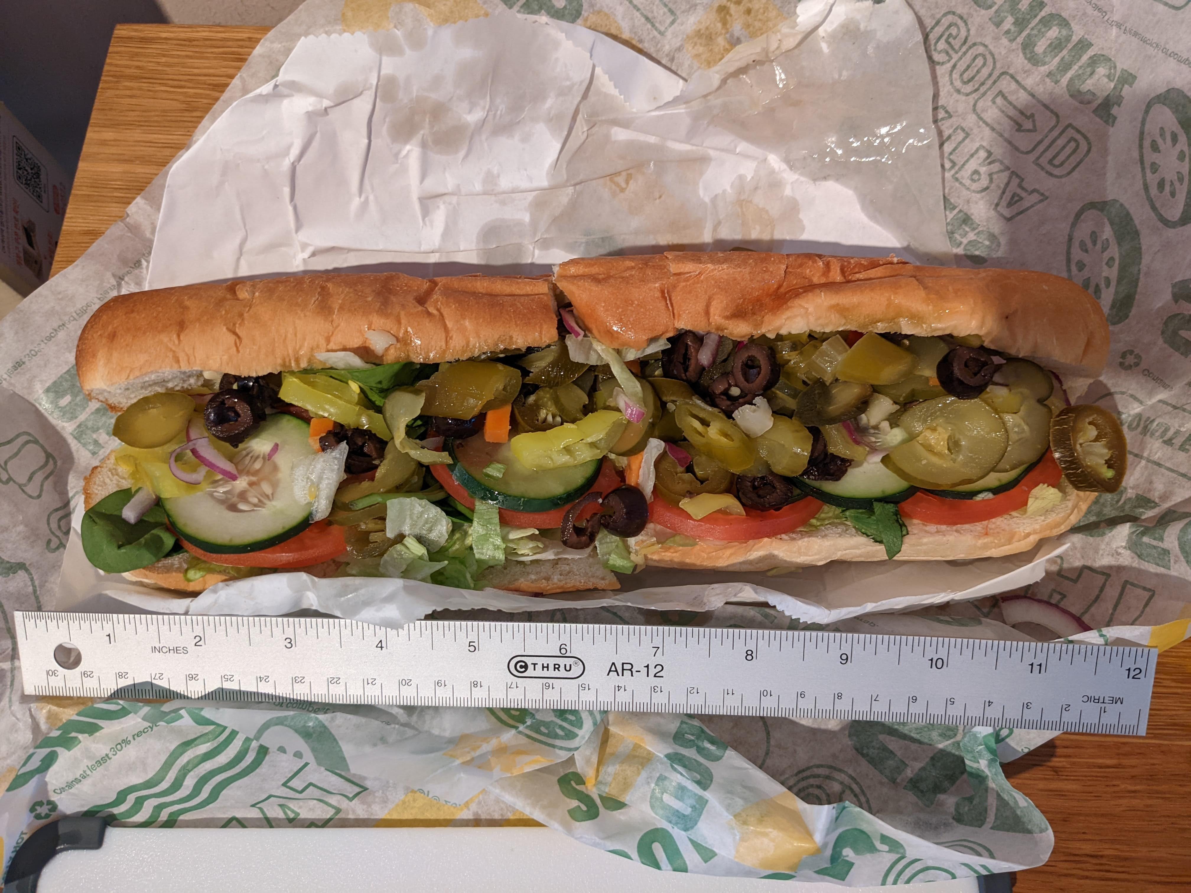 I put three (actual) feet in a footlong - by Dennis Lee