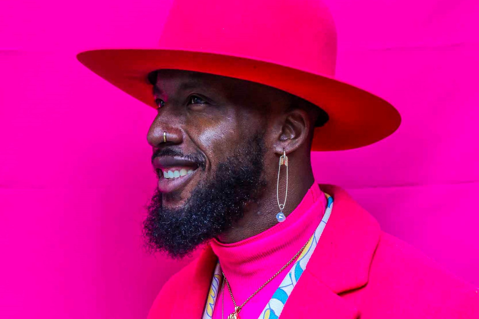 Kay Rufai takes photos of smiling teenagers.