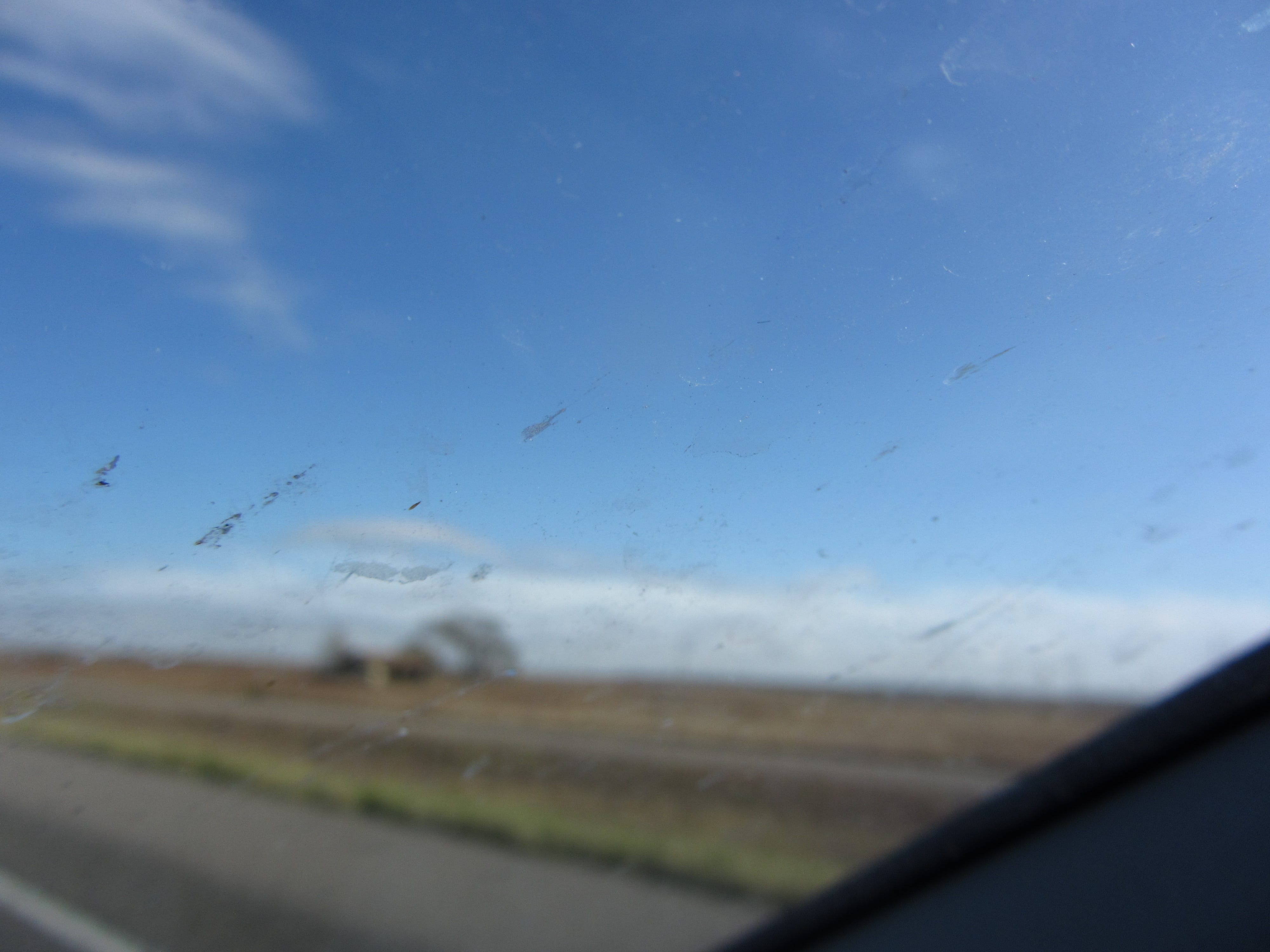 Plasmic Material on the Windshield, While Driving Cross-Country