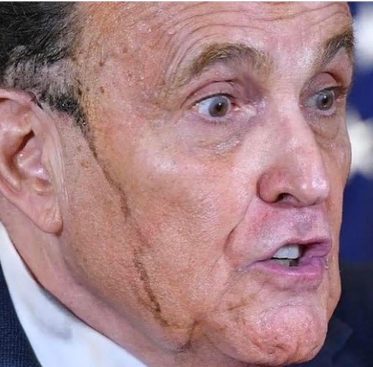 A Clown With a Flamethrower - by Charlie Sykes