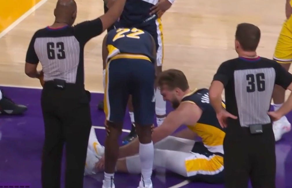 Domantas Sabonis records triple-double, suffers 'significant' ankle ...