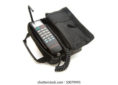 The cell phone. Then and now. - by Freddy D