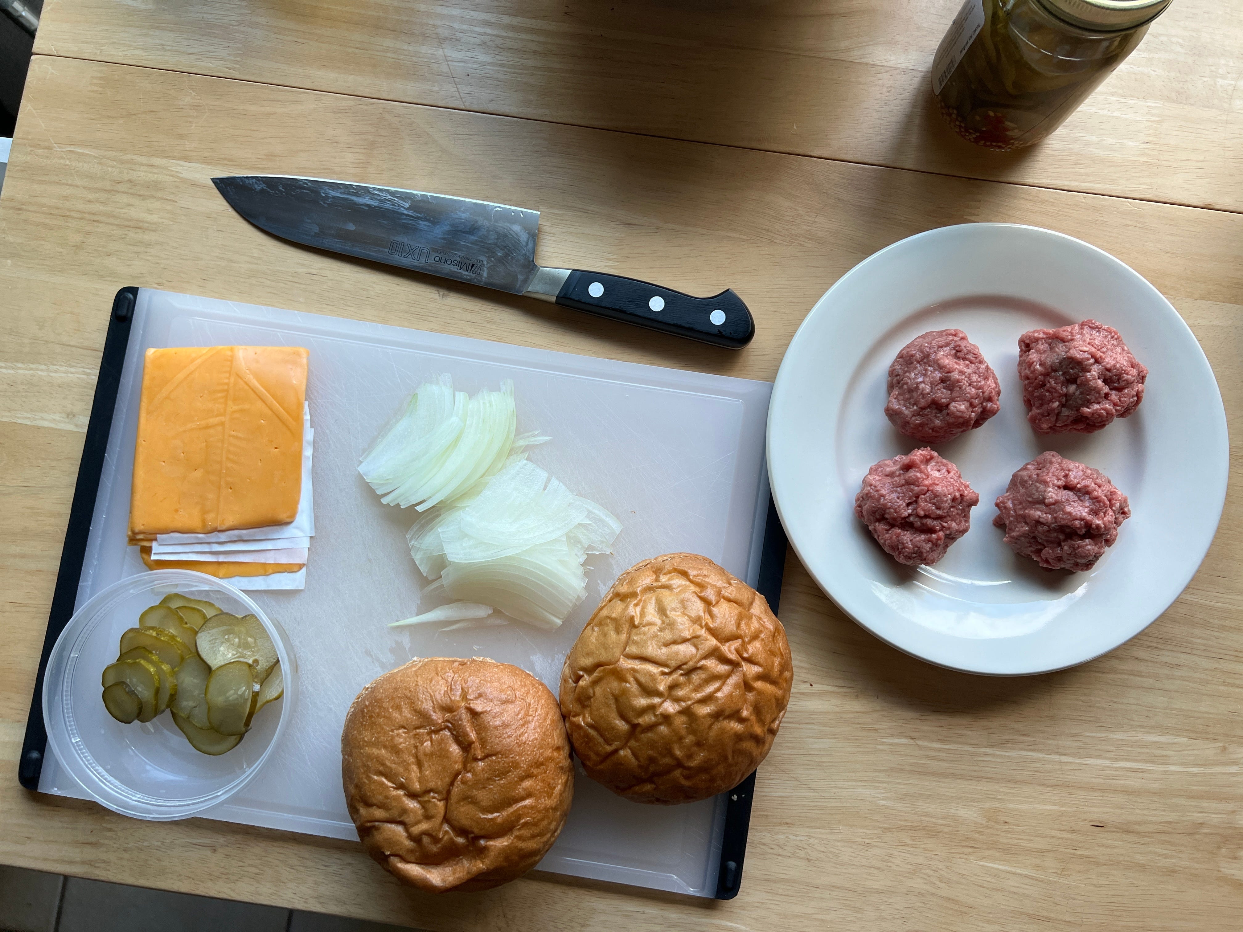 Oklahoma-Style Onion Smash Burgers - by Myles Snider