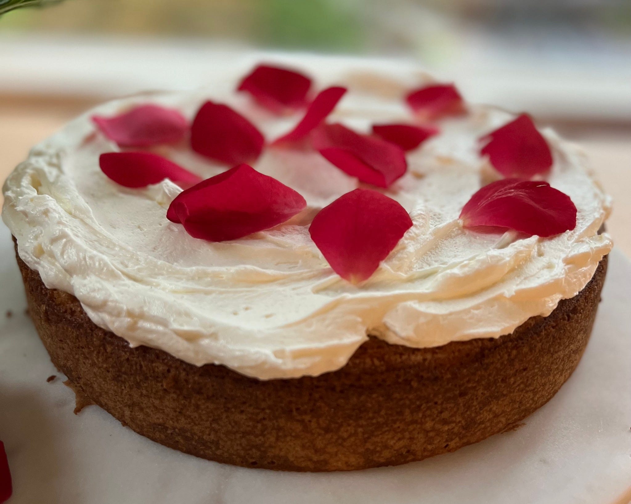 A whimsical French rose and cardamom cake