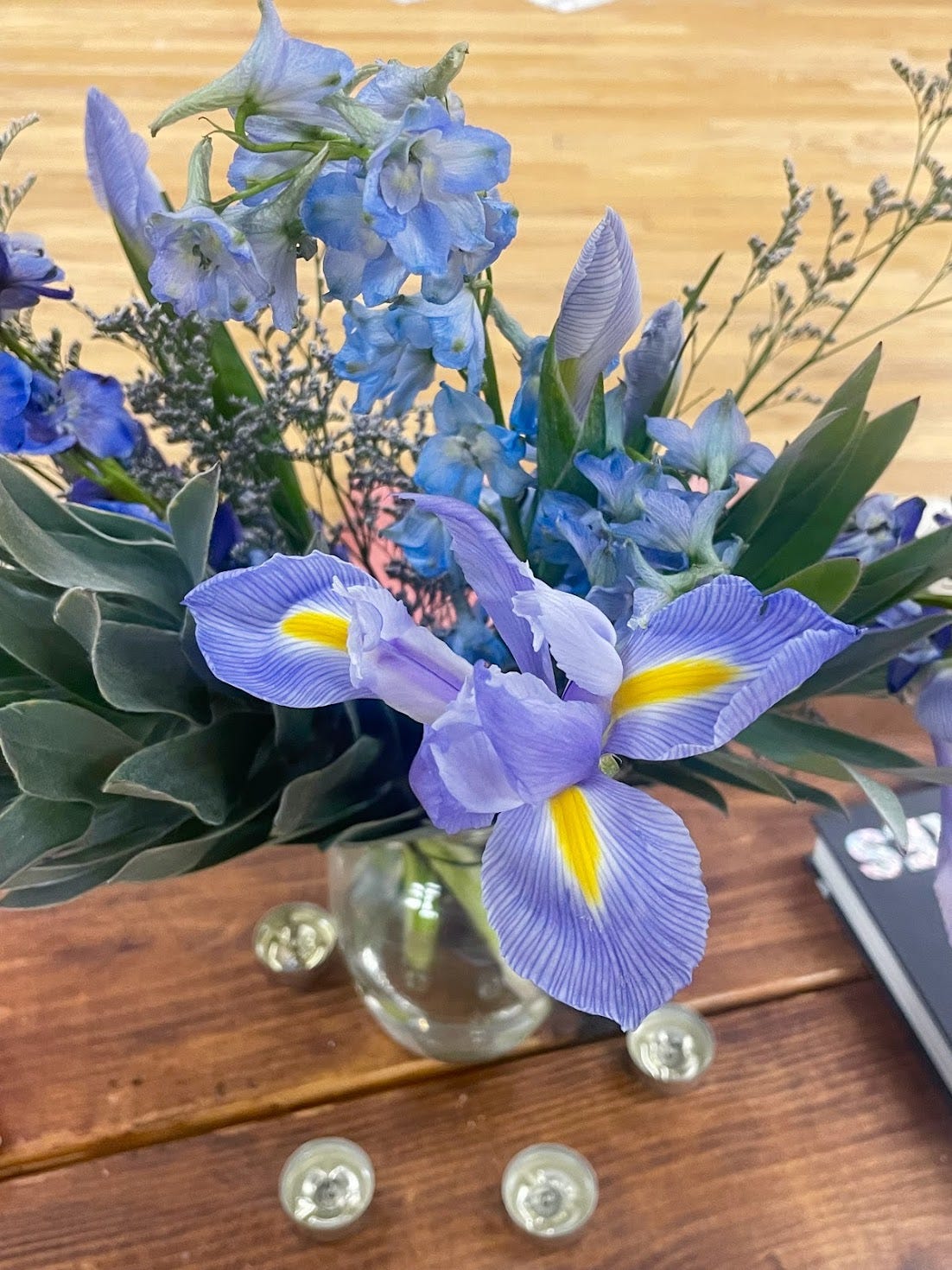 a small collection of spring flowers in bloom