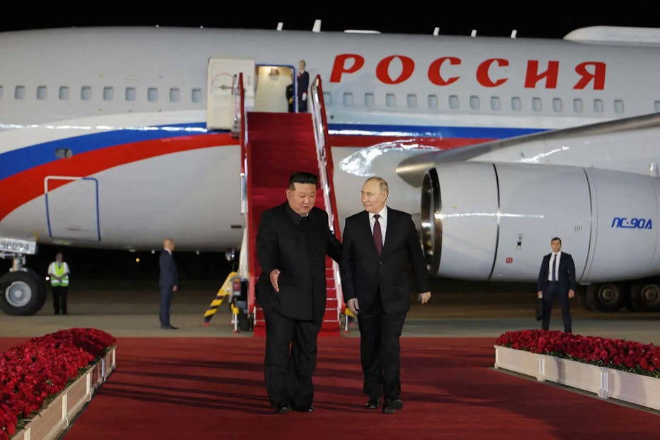 Putin Signs Pact with What's His Name