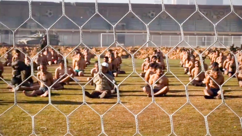 Israeli troops turn Gaza football stadium into mass detention camp