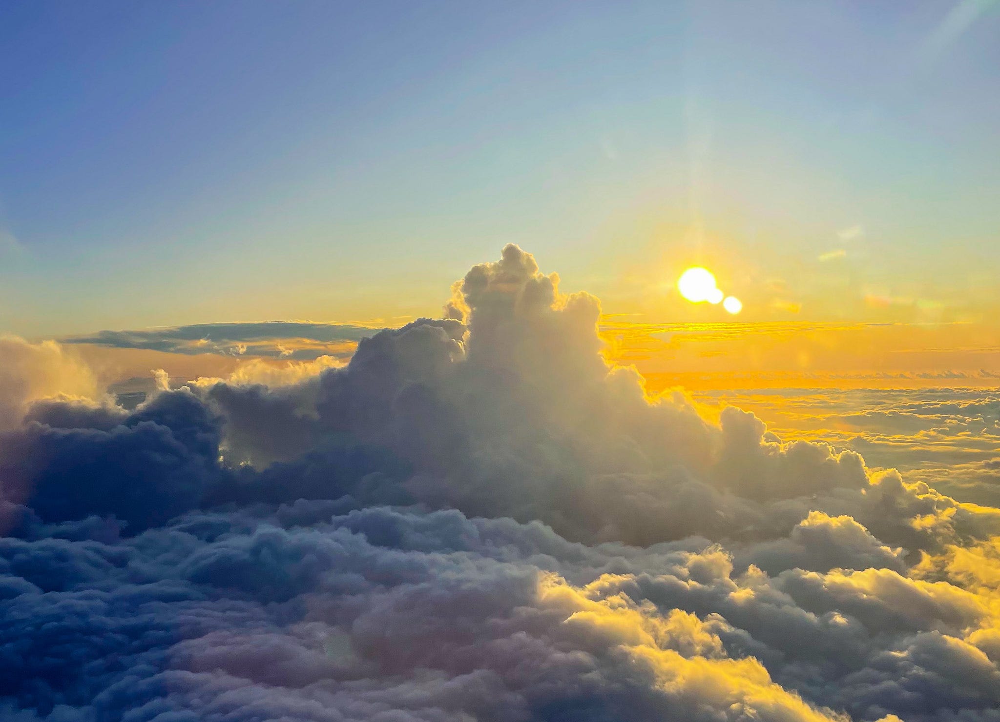 Looking at clouds from both sides now