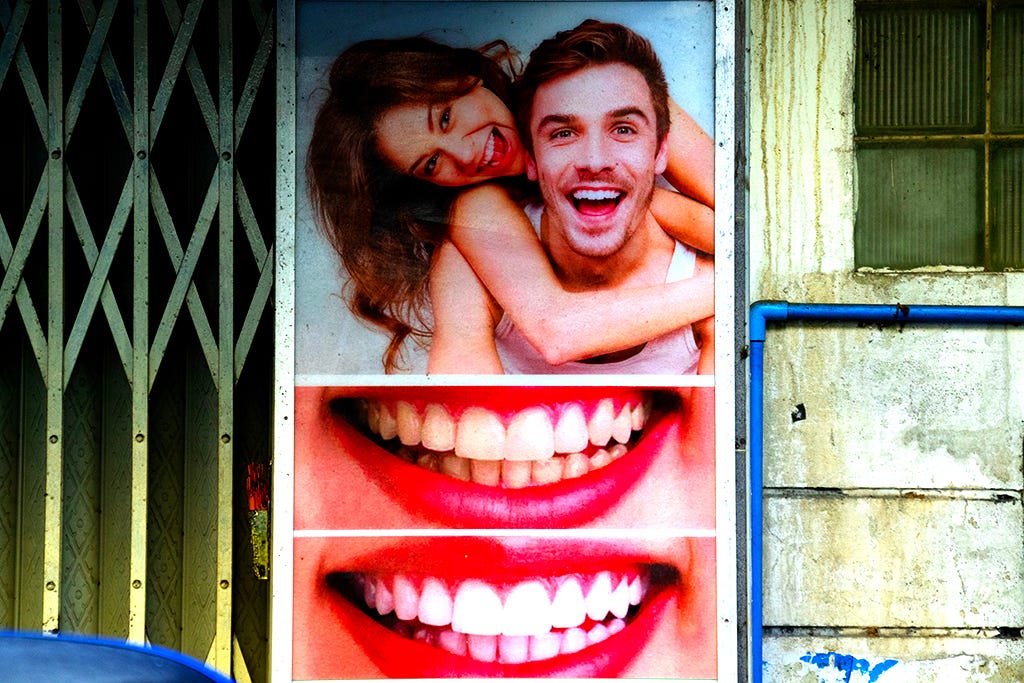 Bombs and Bombast with Perfect Teeth - by Linh Dinh