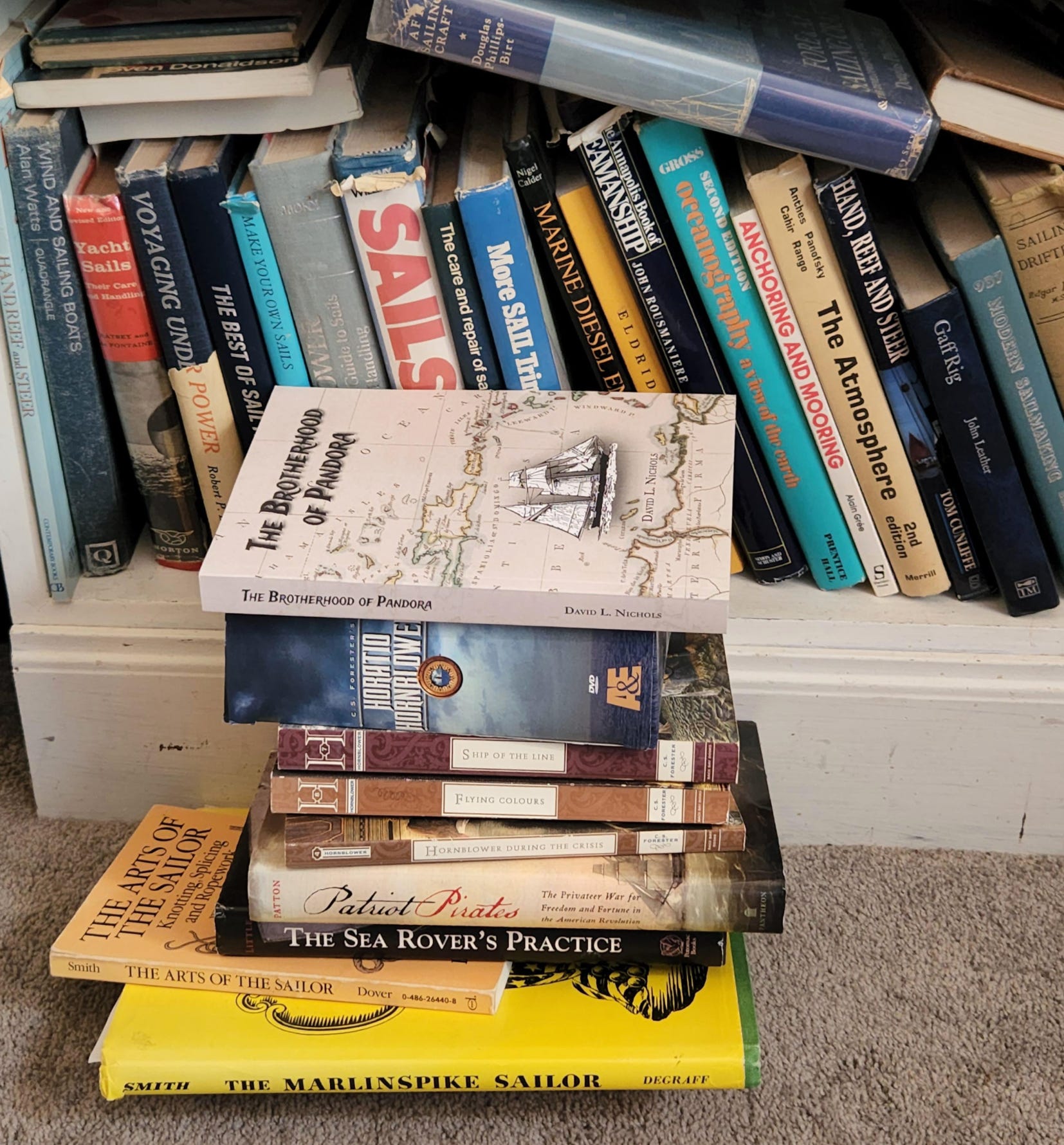 Another Book Stack Plus Another New Boat