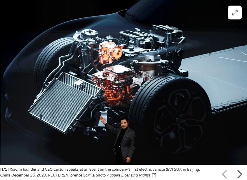 Chinas Xiaomi Unveils First Electric Car Plans To Become Top Automaker