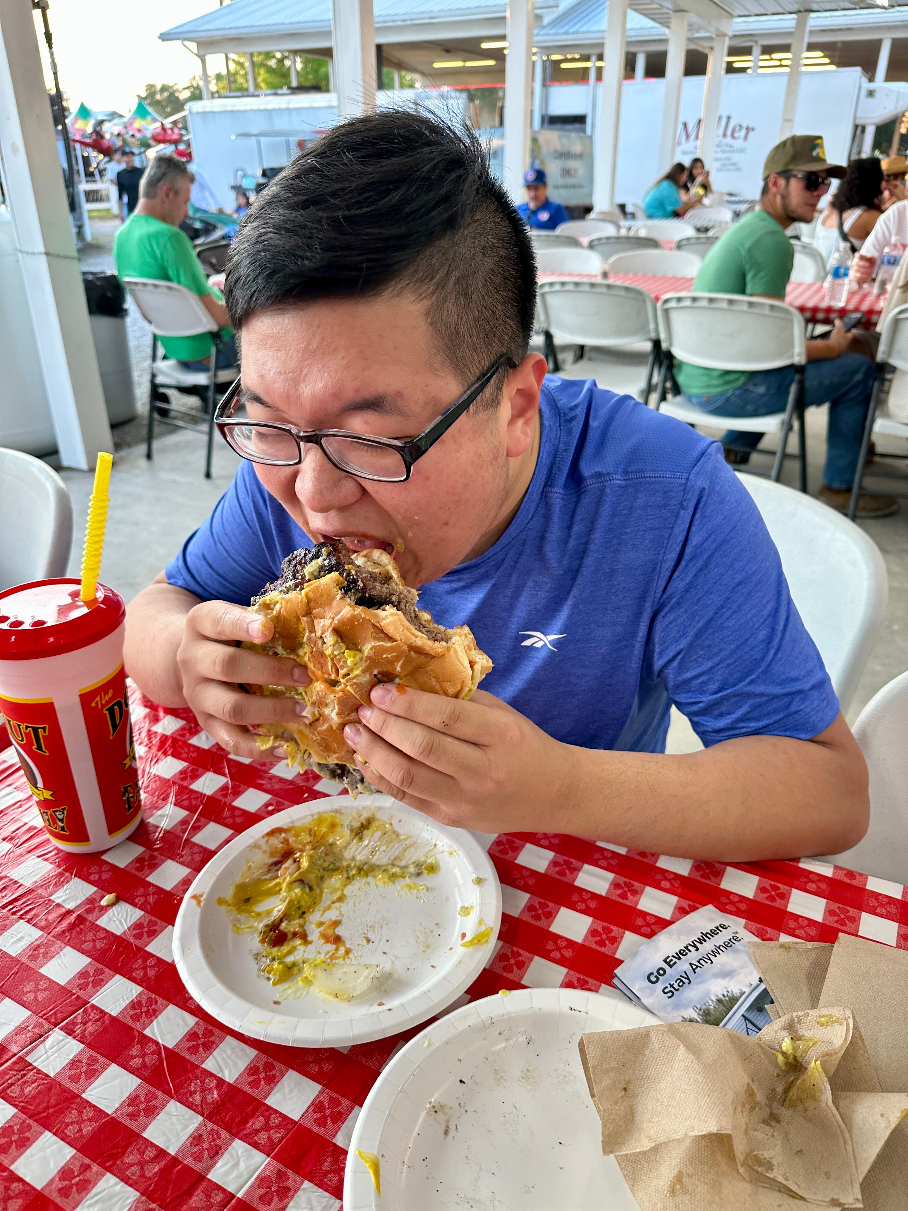 Young Man Conquers Super-Sized Burger at County Fair