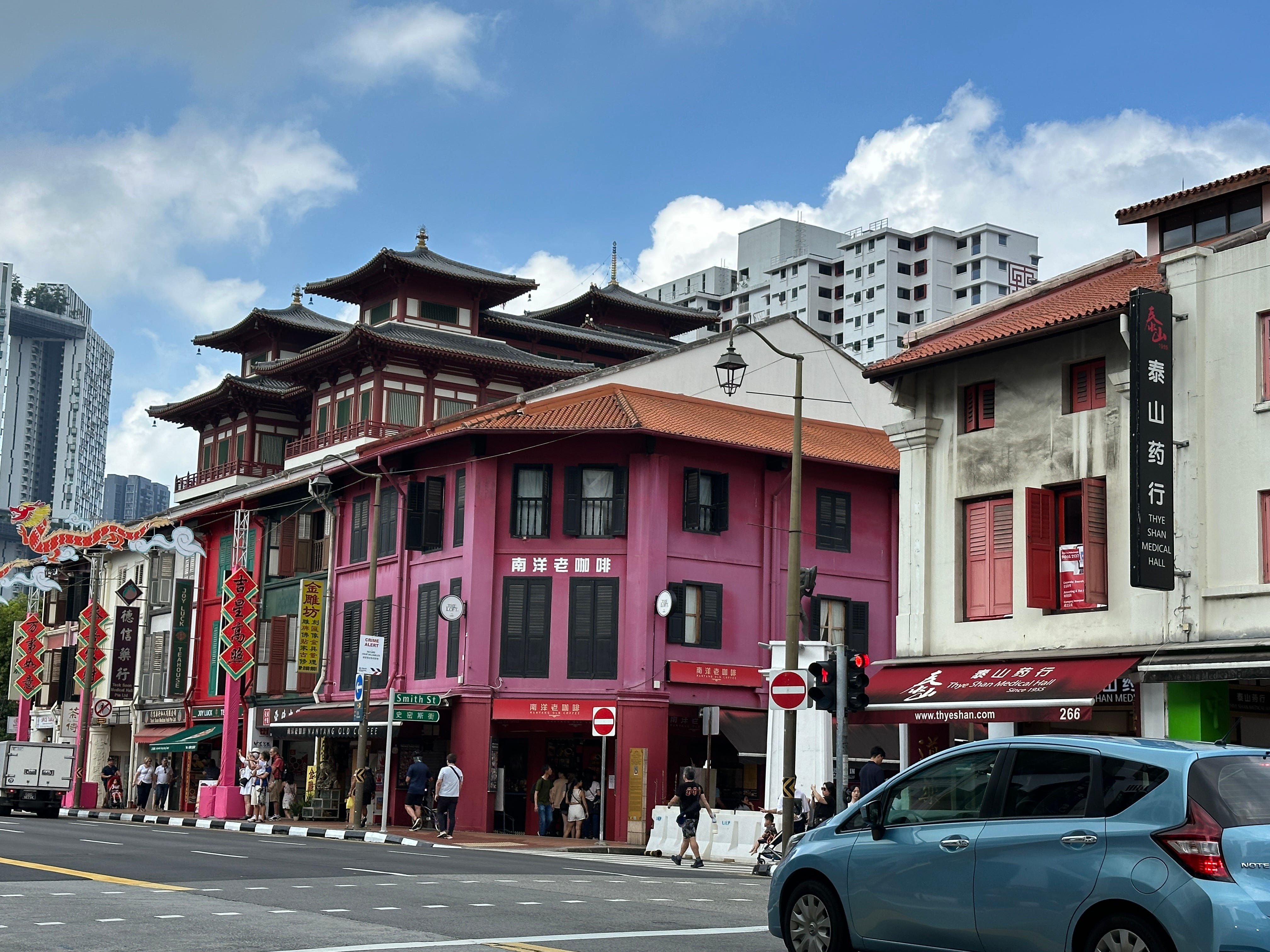 Playing at Chinatown (South Bridge Road) - Paul Wang